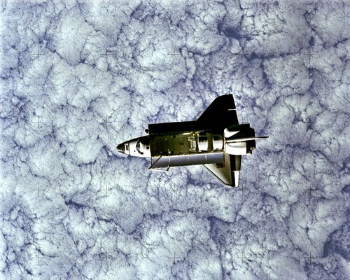 Space Shuttle Orbiter Challenger over the Cloudy Earth | historyshoppe