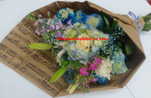 Designer choice Wrapped bouquet, no vase. | Flowers online
