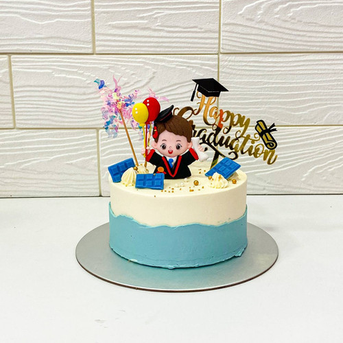 Graduation boy theme Cake | Caramelloz