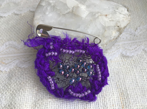Crocheted purple brooch | AngelaSmithJewellery