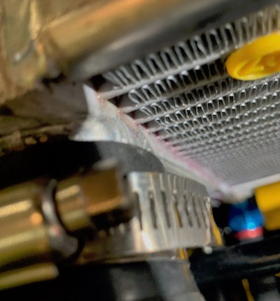 Radiator gives way, starts to leak!