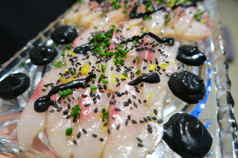 Kingfish carpaccio, black sesame, truffle salt, chives & squid ink aioli
