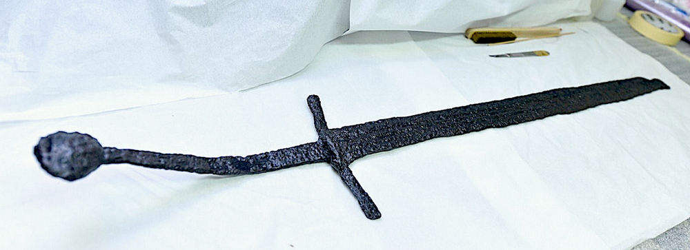 Sword in Stone Rises from Bosnian River