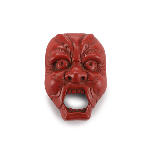 A carved red Lacquer mask netsuke of Genjoraku by Hosai | Z&R Netsuke