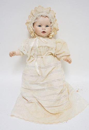 BISQUE HEADED BABY DOLL MEASURING 21 INCHES LONG. | dennisauction