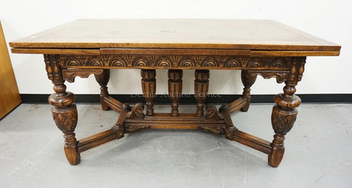 OAK REFRACTORY TABLE WITH A CARVED BASE. 58 1/2 X 38 INCH TOP. PULL OUT ...