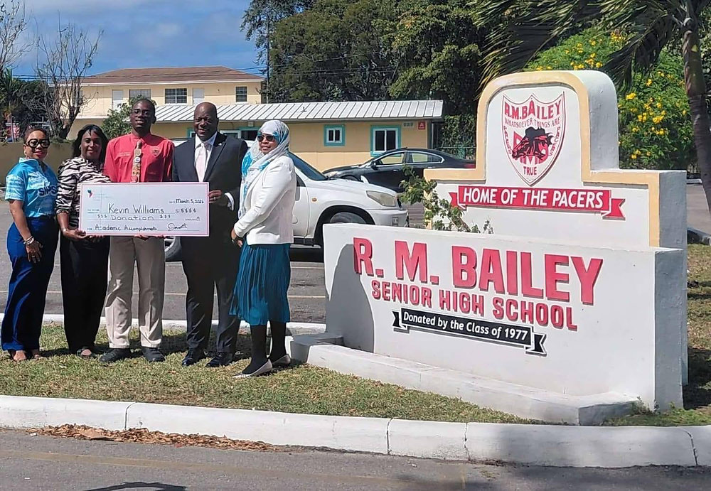 R. M. Bailey Head Boy Kevin Williams Receives Donation from Bahamas ...