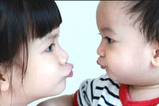 Why do children with autism avoid eye contact?