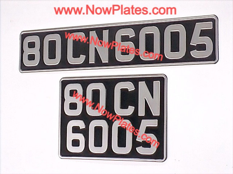 VINTAGE PRESSED NUMBER PLATES OBLONG AND SQUARE