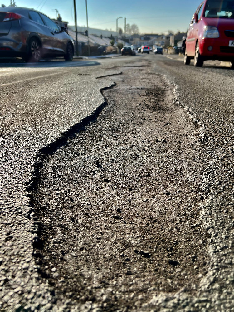 Growing Pothole Problem in Crown Hill Poses Safety Risk to Drivers and ...