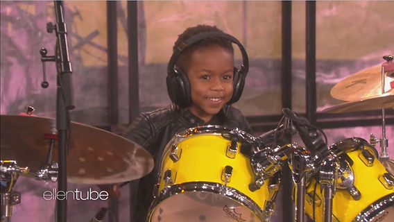boy playing drums
