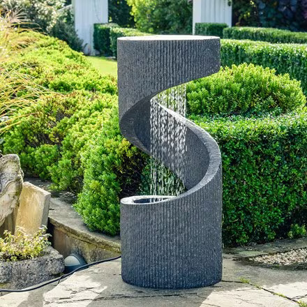 Outdoor spiral water feature granite | home
