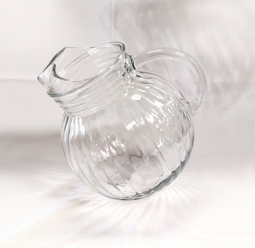 Tilted Ribbed Glass Pitcher | Herriott's Rentals