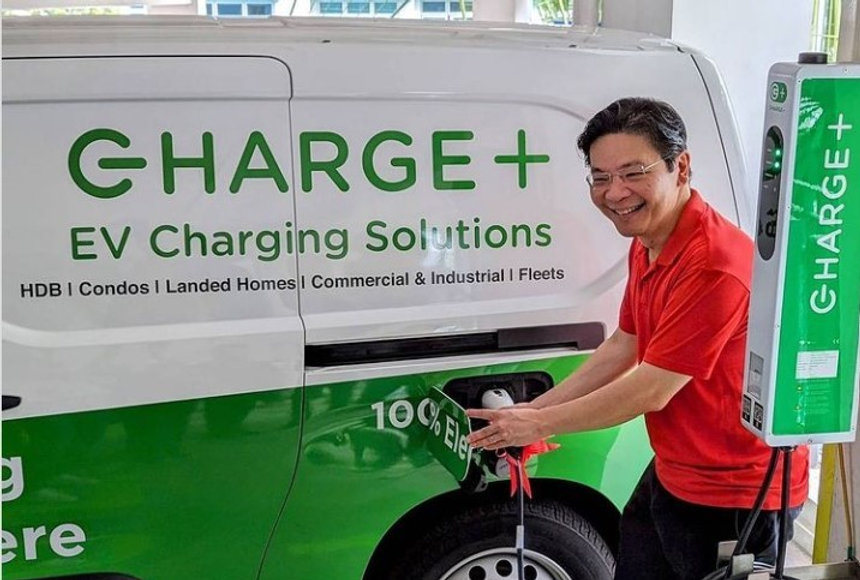 DPM Lawrence Wong launches CHARGE+ EV charging station at Block 573A ...