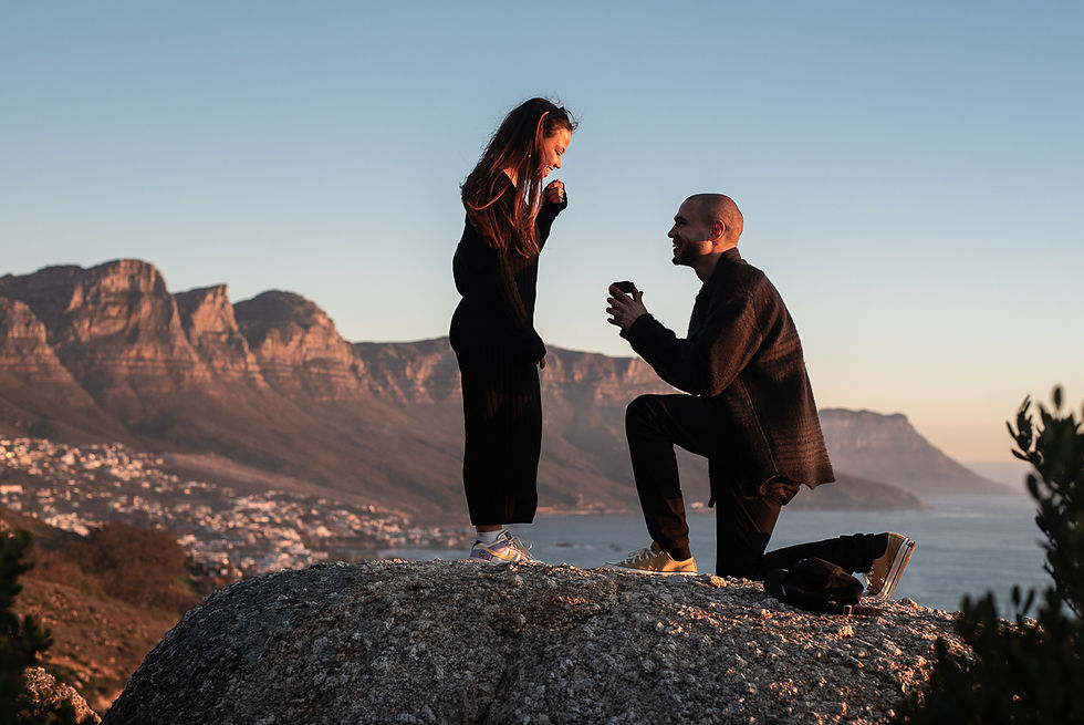 A beautiful sunset proposal overlooking Cape Town 12 Apostles mountains