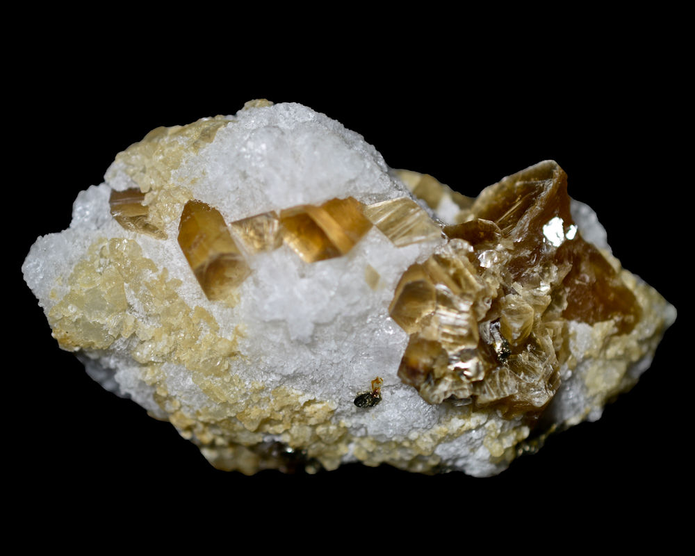 Phlogopite, Forsterite in Marble from Afghanistan.