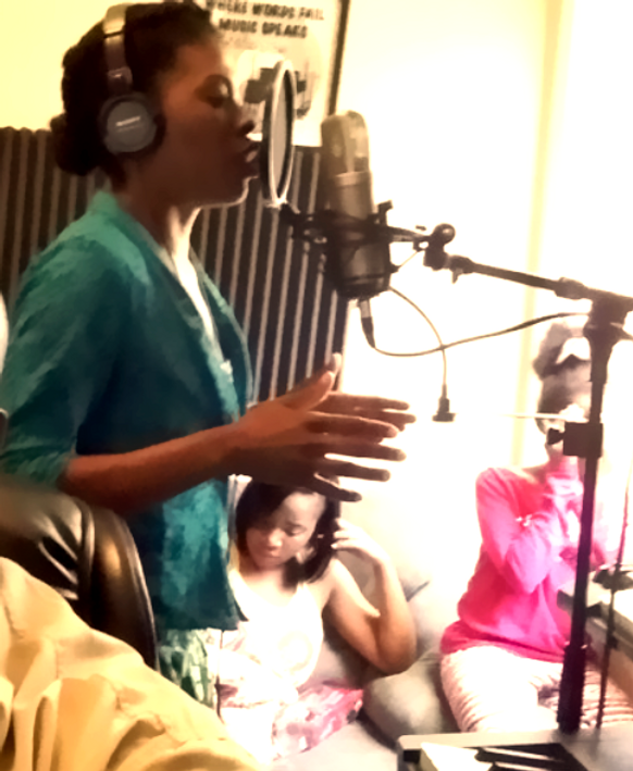 Behind the recording studio walls