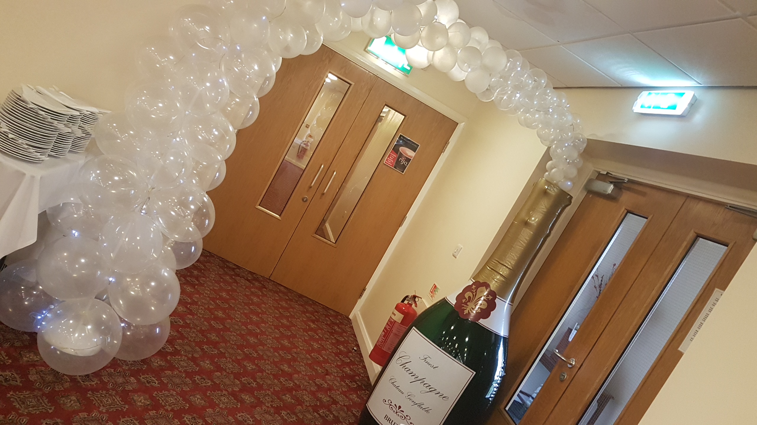 Twinkling Champagne Bottle Arch | Glamourpuss Weddings | Barnsley