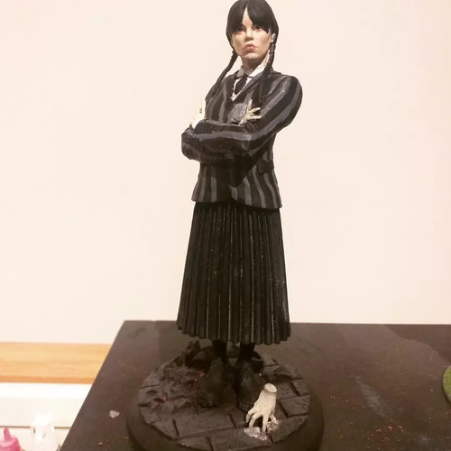 Wednesday statue | Breaking The Mold
