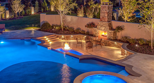 25,000 Gallon Pool with Built-In Hot Tub and Fireplace | prestigepools