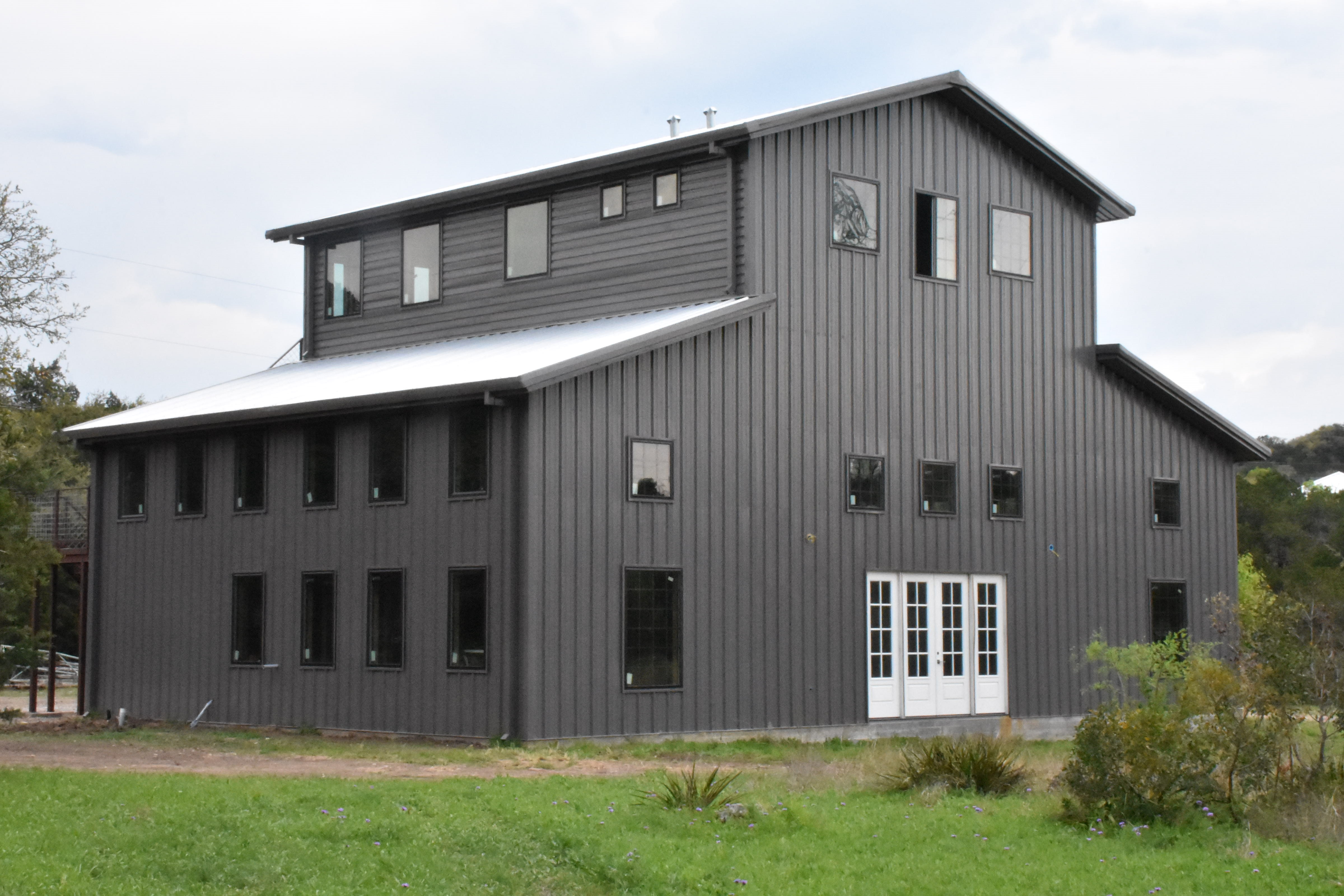 Concrete, metal buildings, barndominiums, water features