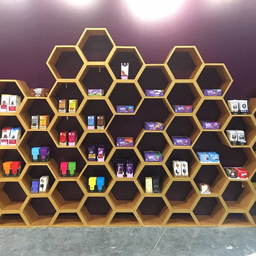 custom full-wall honeycomb shelving unit with doors & divider shelves ...