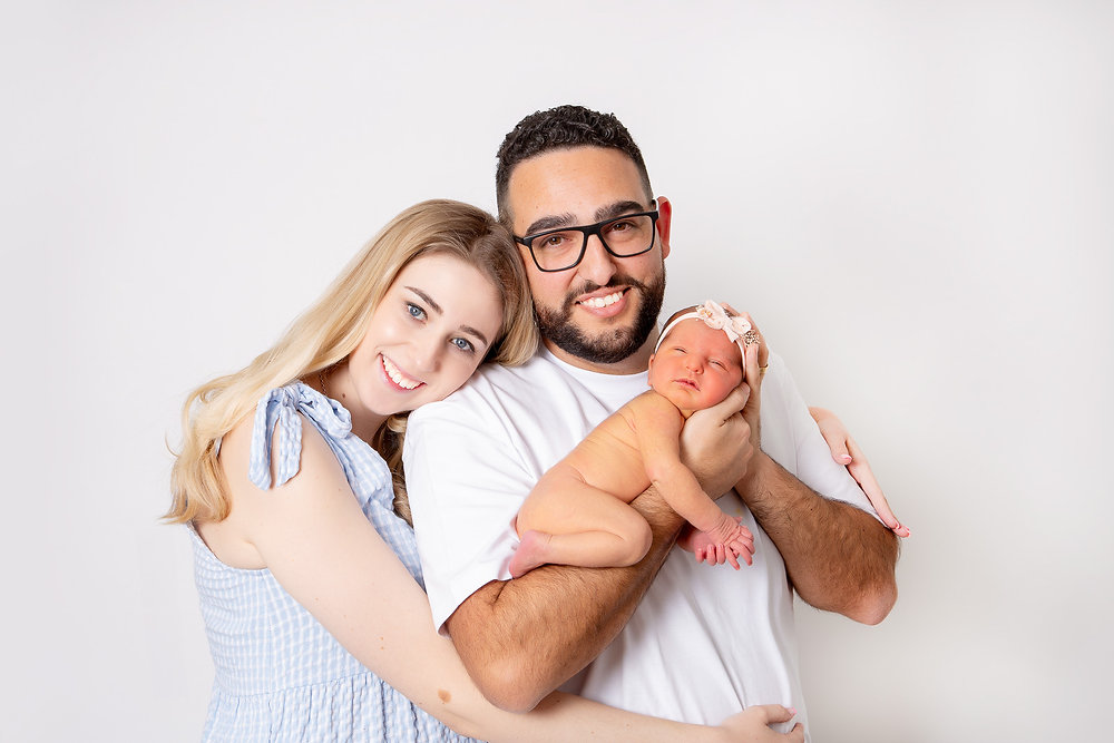 Young families with their first new baby girl
