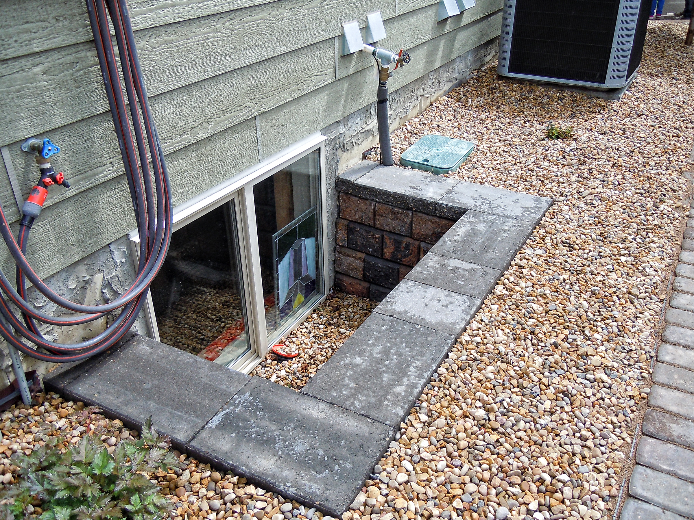 WINDOW WELLS | almaclandscapes