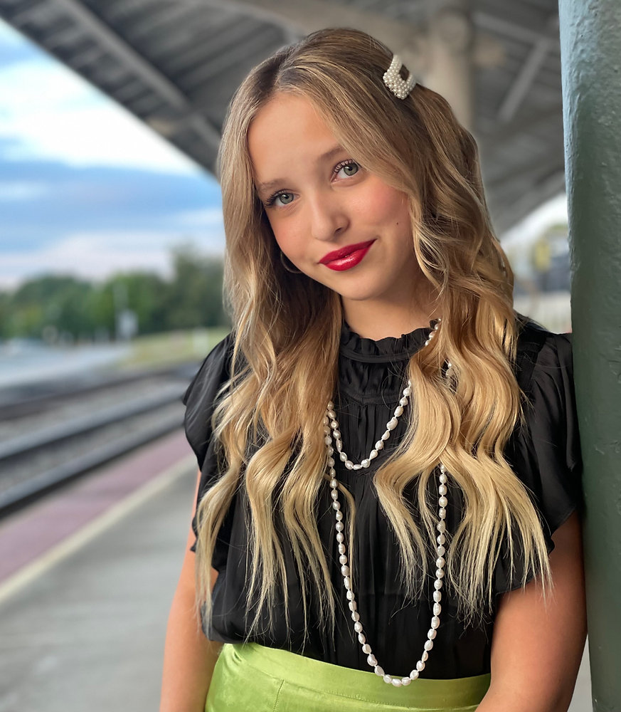 Lilly K Continues to Dazzle Fans on Viral Vertical Content