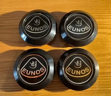 Eunos Wheel Centre Caps (Black/Gold badge) | Pink Lily Pad
