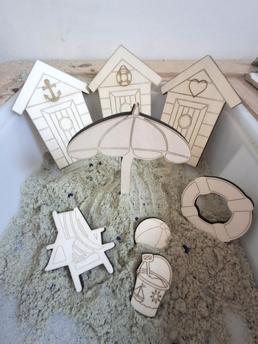 Wooden beach huts and loose parts | Pop’s Creative Play