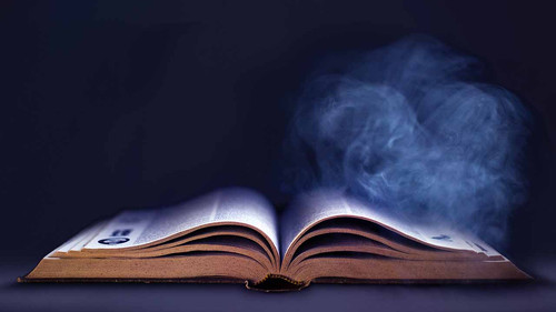 Old mysterious book with smoke in a spotlight | Magician Masterclass