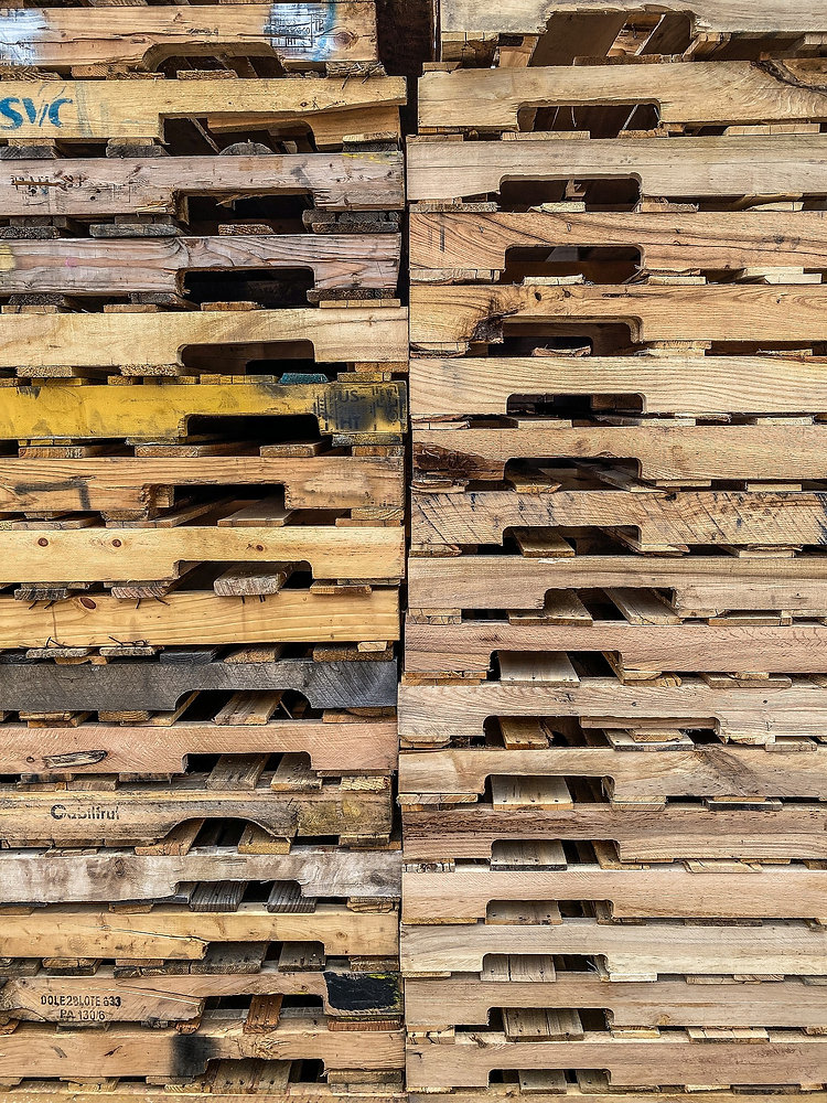 Refurbished Pallets: A Closer Look at Used Vs. New