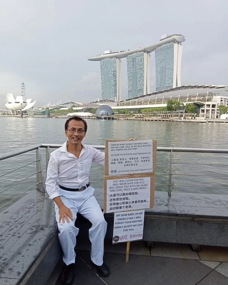 Bespectacled middle-aged uncle publicly professes his undying love for ...