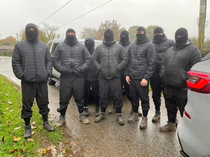 Town and country: Masked rioters hold up an ugly mirror to hunt sabs