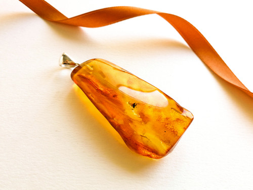 Rectangle shape genuine amber pendant with insect in light cognac color ...