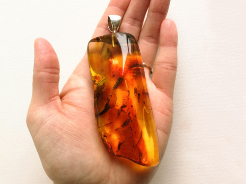 Large intense cognac color natural amber rectangle pendant with bugs ...