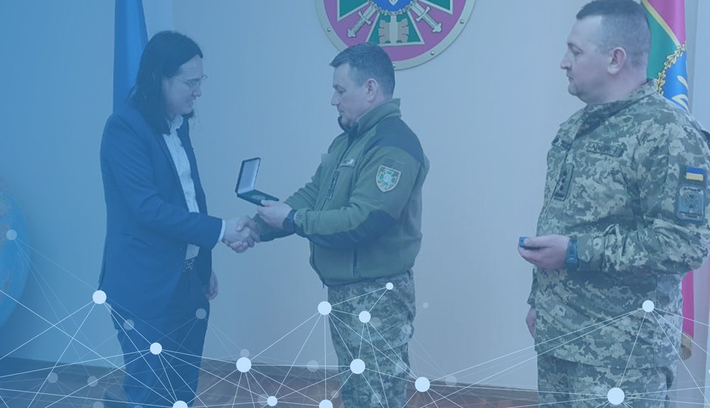 border guards holding hands