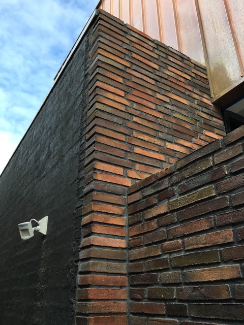 Copper and Petersen bricks produce a superb & timeless palette