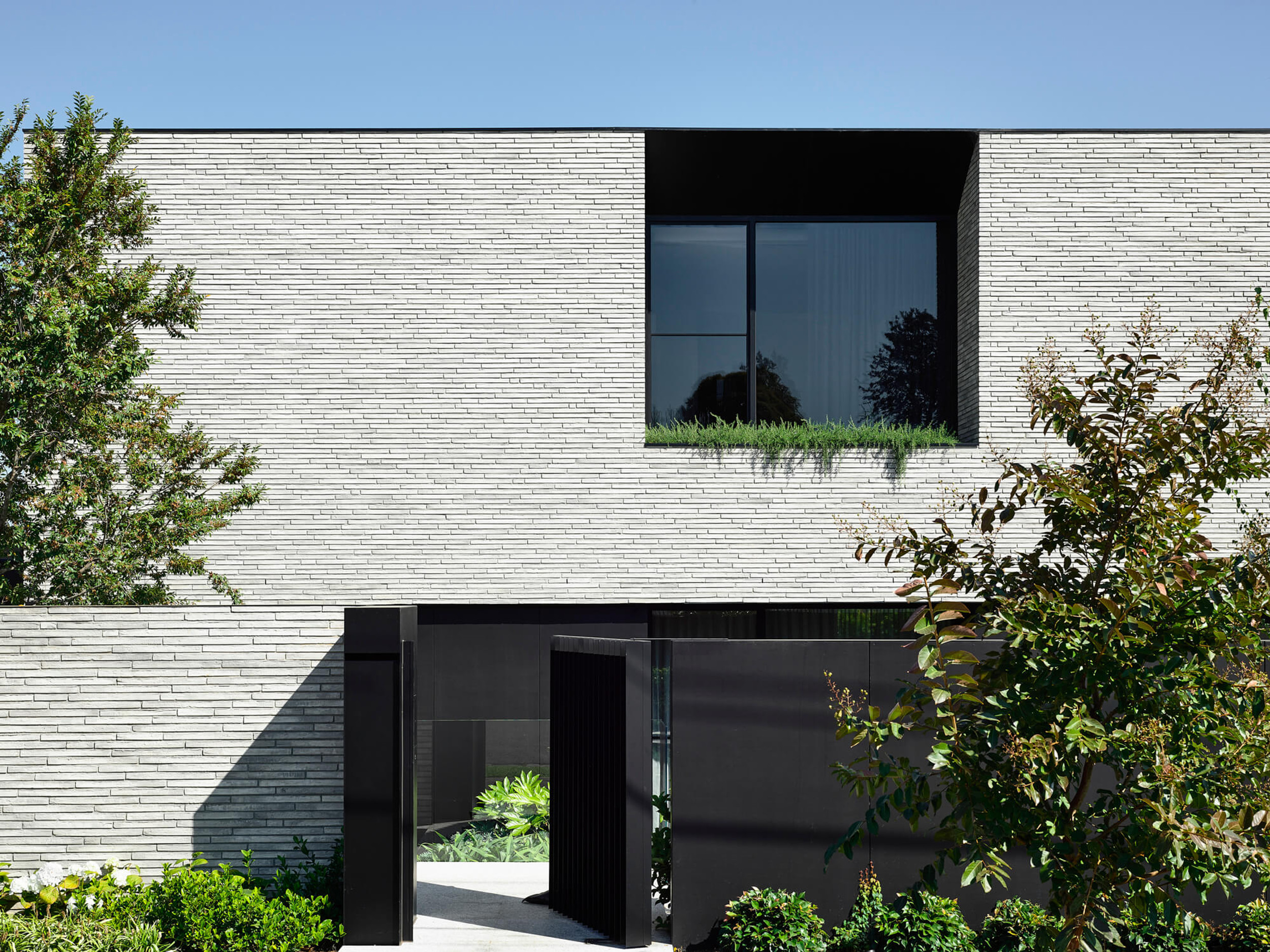 Handmade Petersen Kolumba™ bricks are a soft, tactile presence at the ...