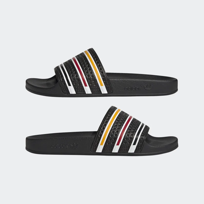 ADILETTE SLIDES Core Black / Cloud White / Team Colleg Gold | الحوت ستور