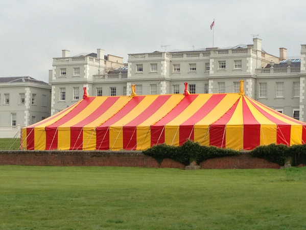 Red & yellow circus tents | UK | Lucas Jet Circus Performer