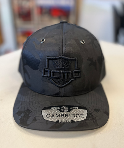 BLACK CAMO TRUCKER HAT - ALL BLACK DCMG LOGO | DCMG