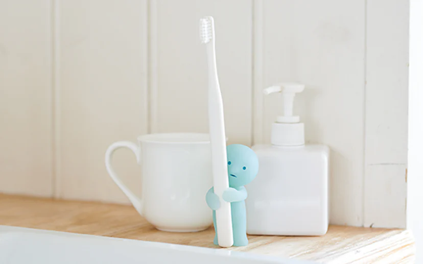 Smiski Toothbrush Stand - Holding | MOOII Australia