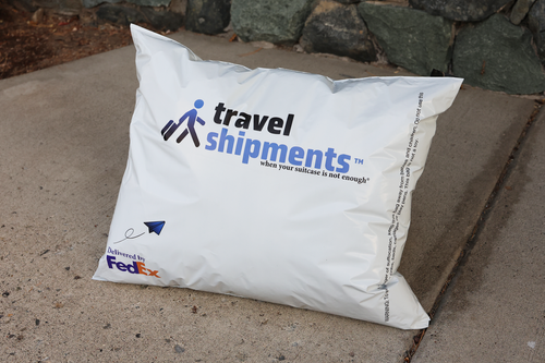 Large 20 x 24 inch pre-paid FedEx® shipping bag, white with paper plane ...