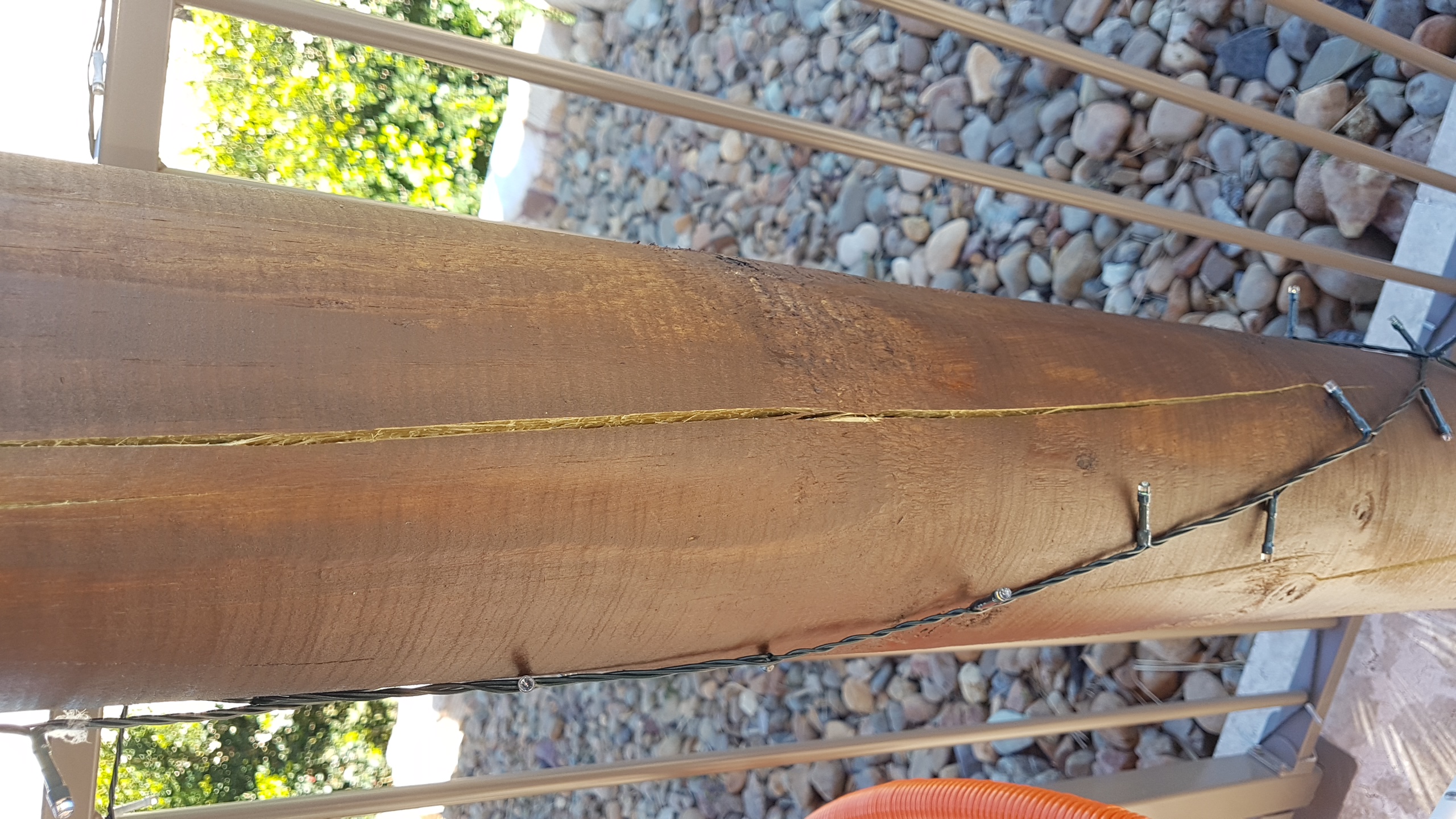 Cracks in Coppers log post for Balinese Huts Brisbane South East Queensland