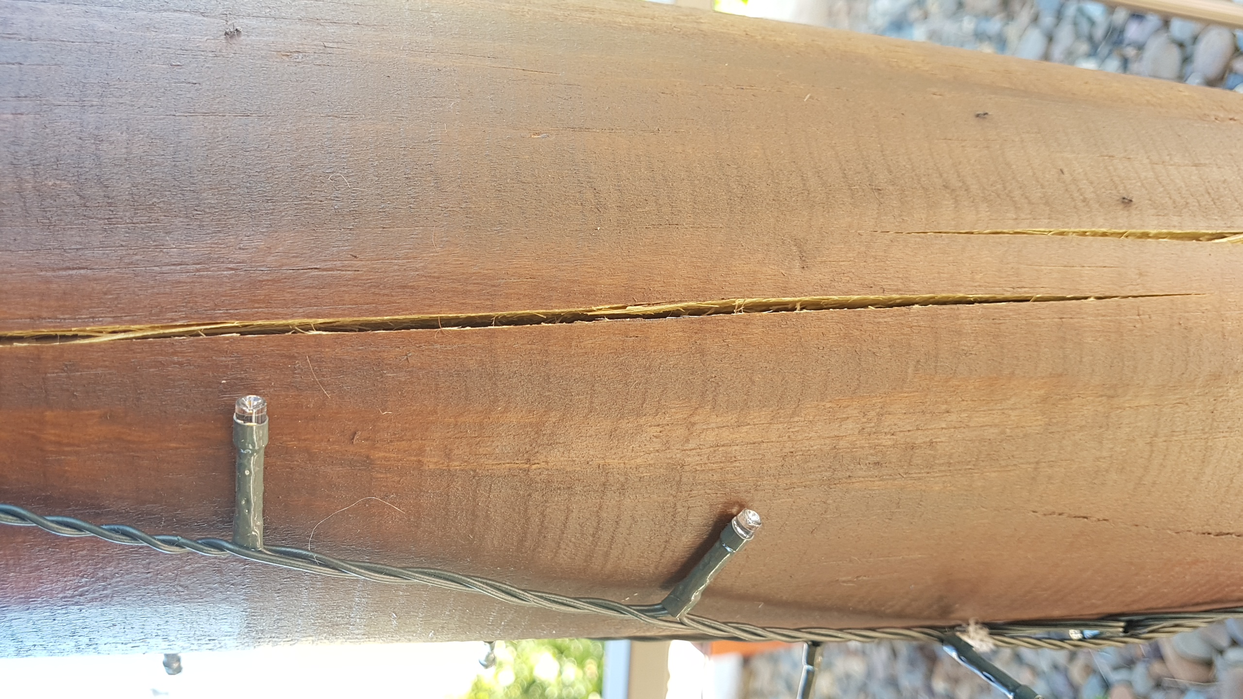 Cracks in Coppers log post for Balinese Huts Brisbane South East Queensland