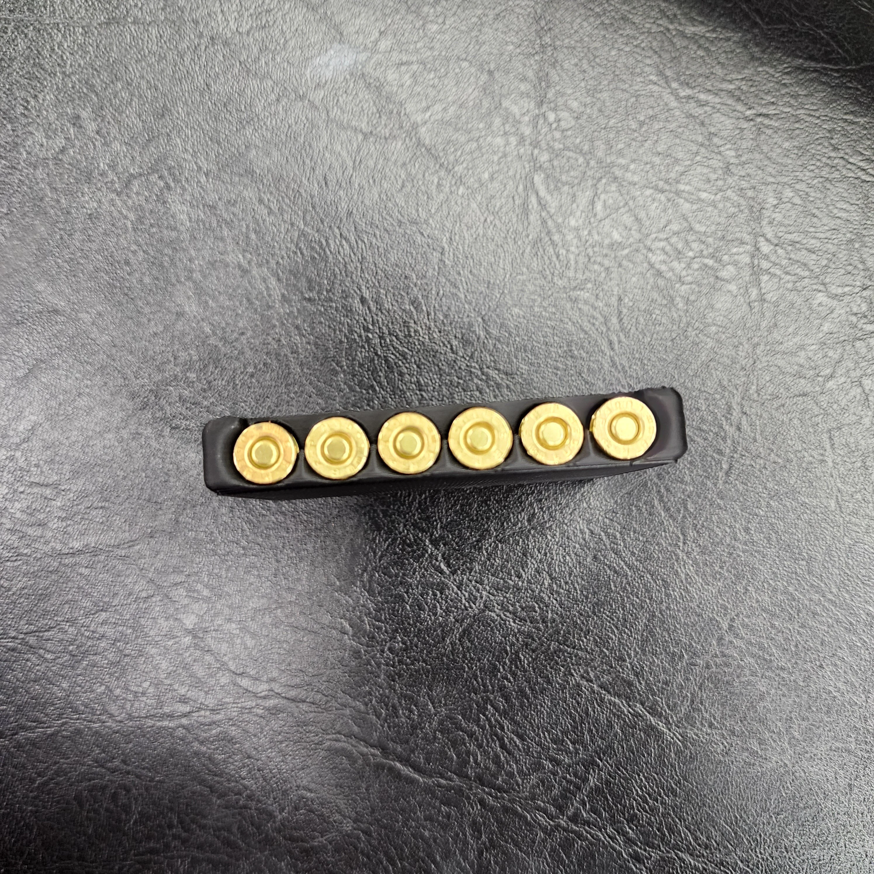 Shell Holder for 9mm EDC pocket carry. Holds Twelve 9mm shells in a ...