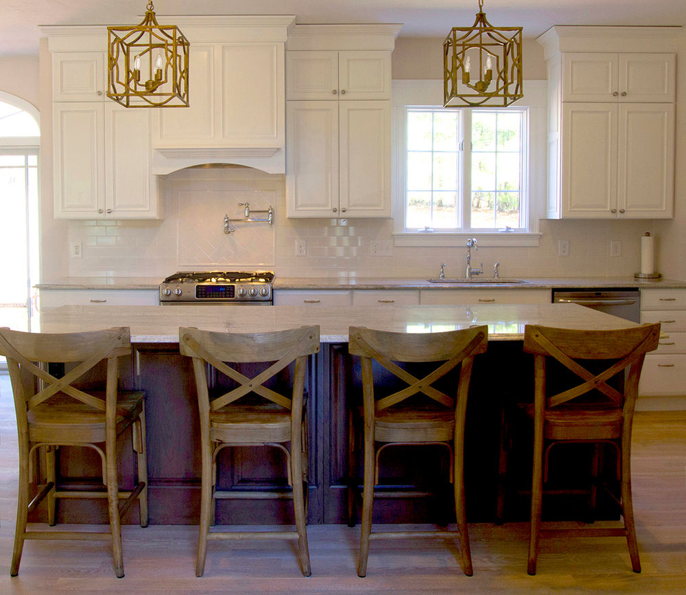 White Raised Panel Cabinets in Kitchen