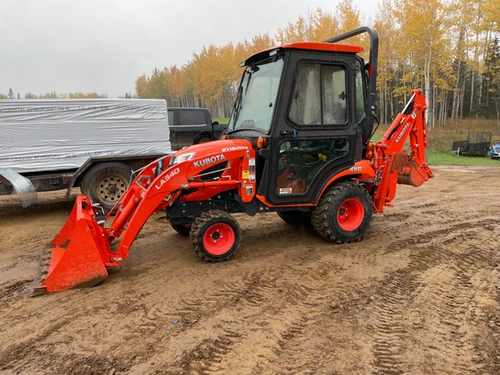 Kubota BX23S Cabbed Mini Backhoe Rental | Lawns by Atlantic